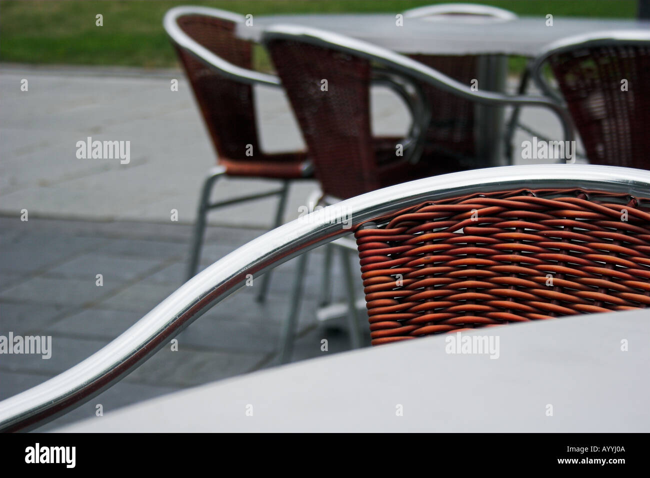 Empty chairs and table outside Stock Photo - Alamy