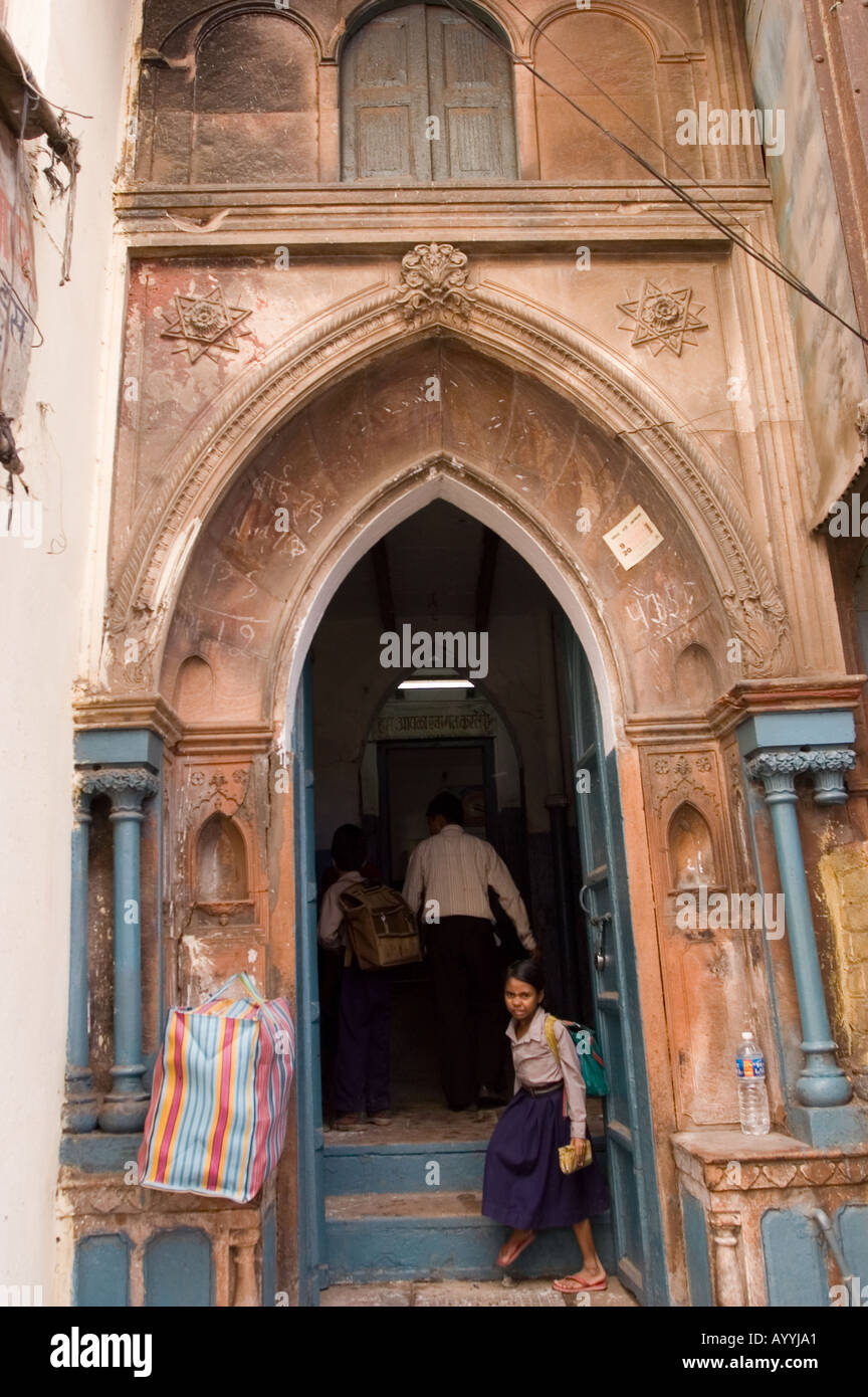 School girl leaving old style school building in New Delhi India Stock ...