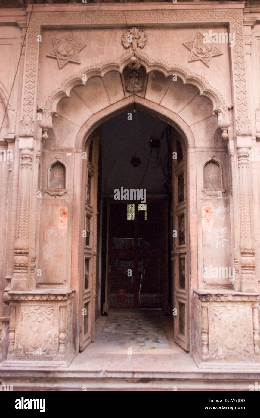 Rich carved stone entrance gate to heritage building Old Delhi India ...