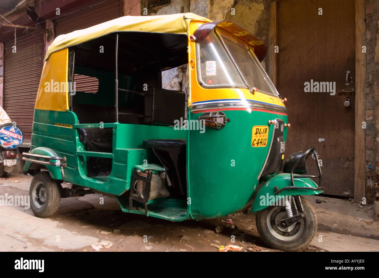 Yellow green classical Indian motor rickshaw New Delhi India Stock ...