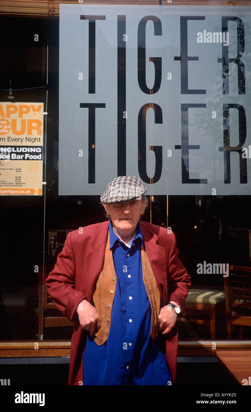 Man wearing cloth cap hi-res stock photography and images - Alamy