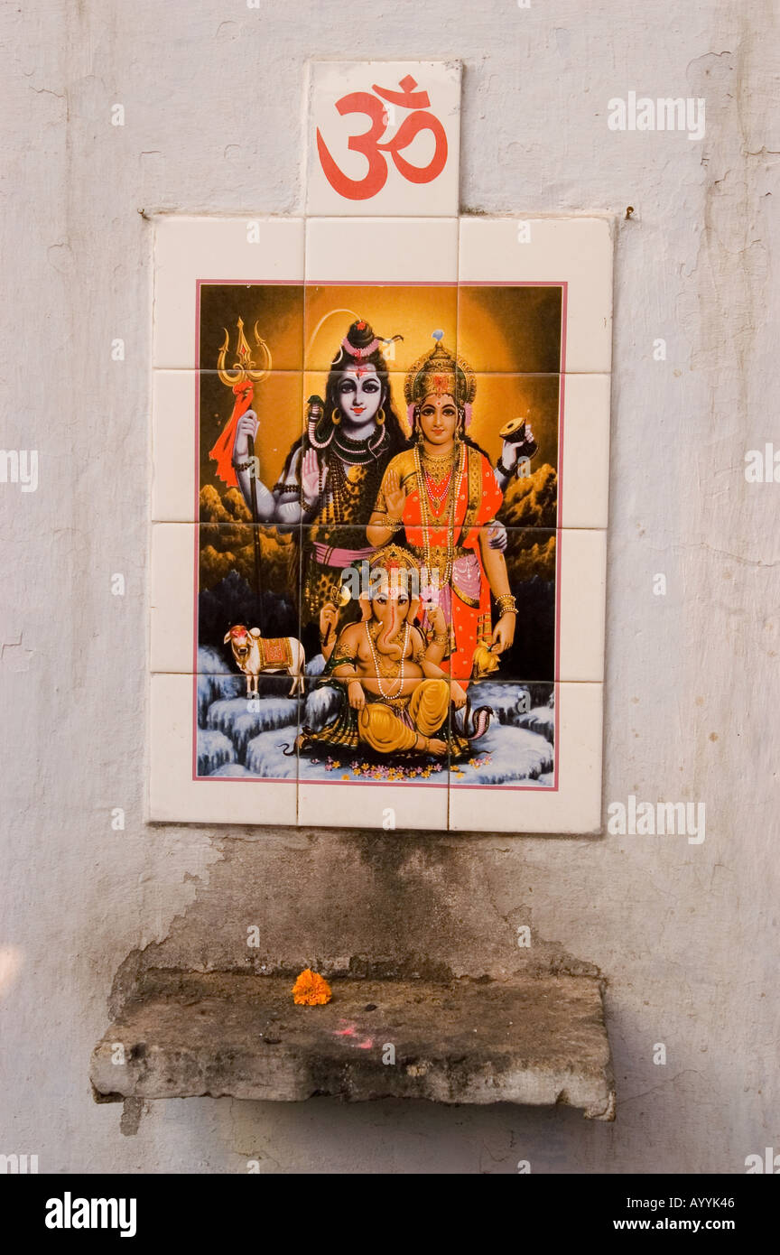 sign Indian holy OM sylable and Hindu gods Lord Shiva and his consort ...