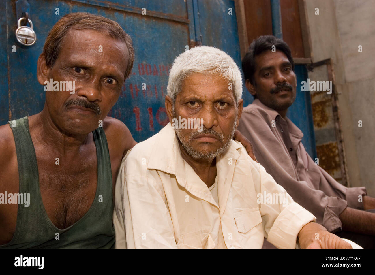 Group of Indian men seriously looking at camera Stock Photo - Alamy
