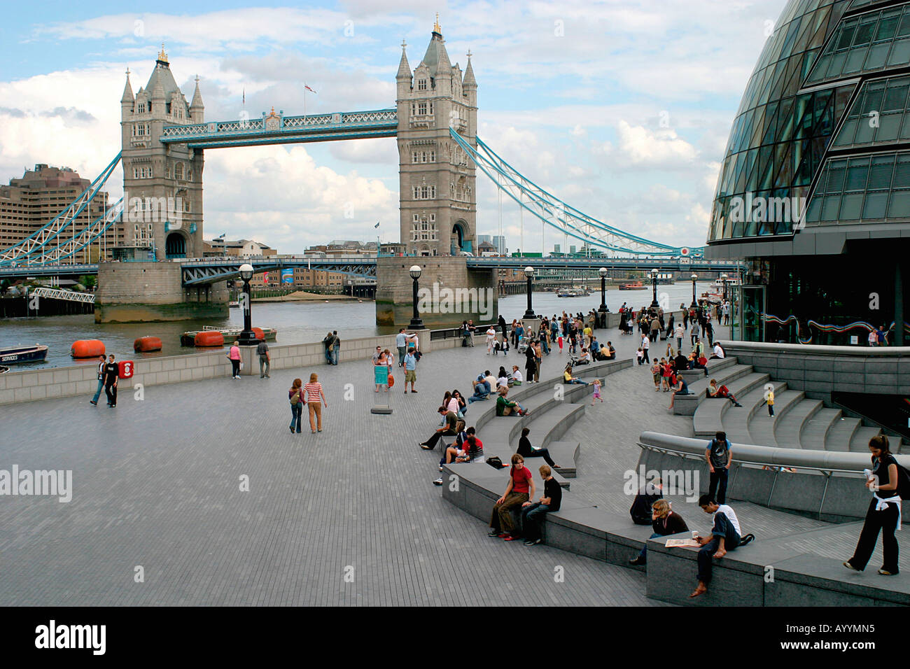 Tower Bridge and The Greater London Authority Building with tourists ...