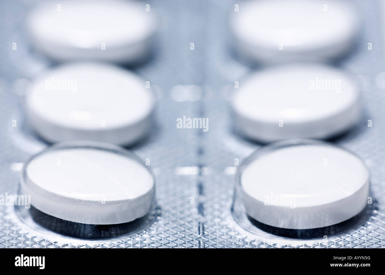 White paracetamol tablets in a blister pack with sharp focus on the ...