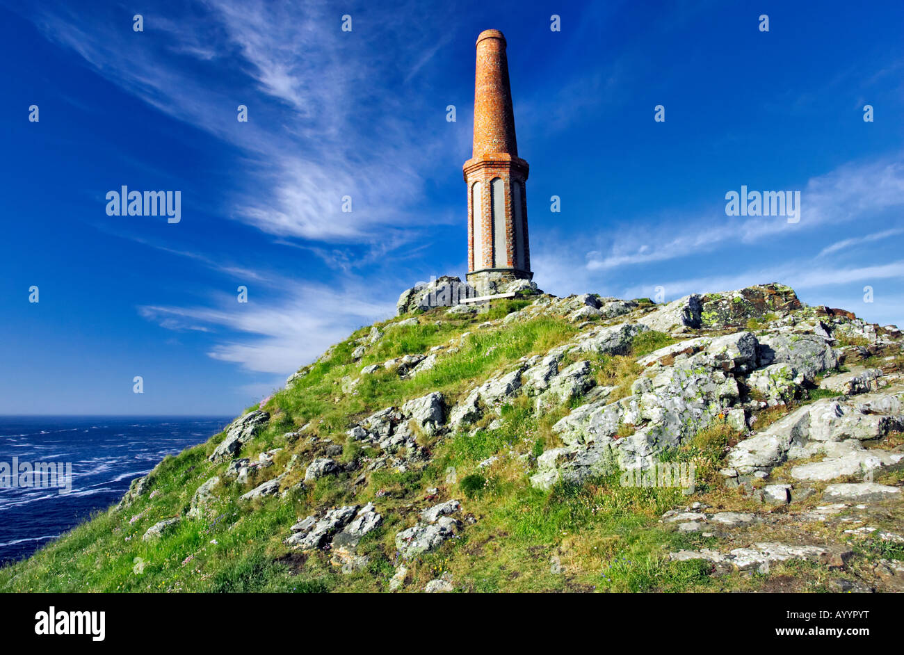 A chimney stack from an old tin mine at the top of Cape Cornwall ...
