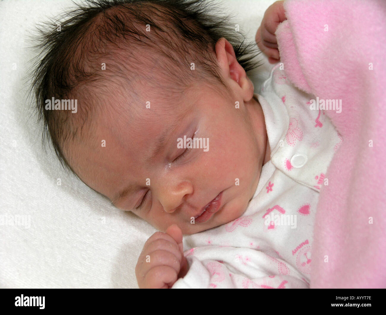 New born baby girl sleeping Stock Photo - Alamy
