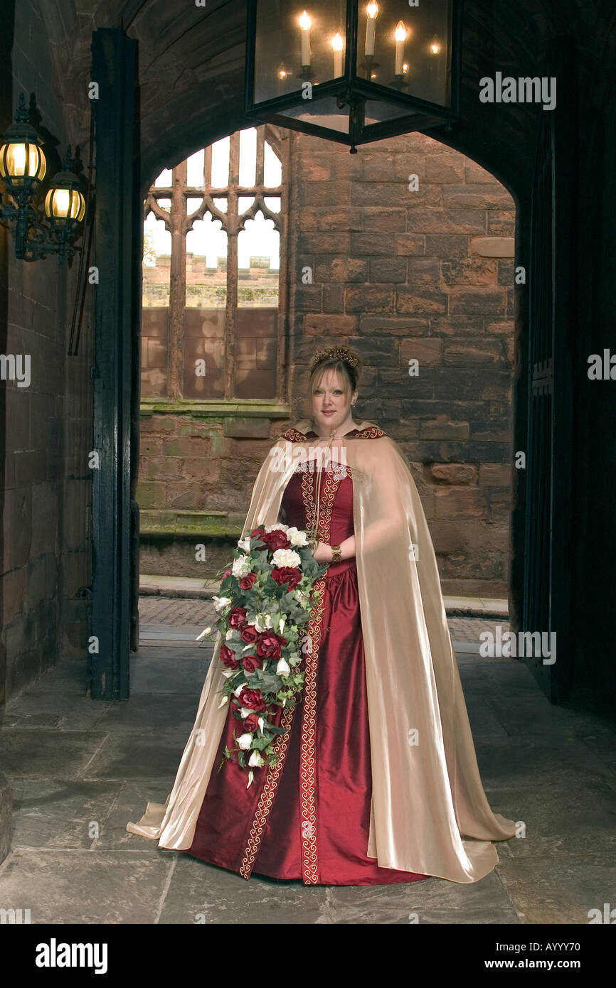 Beautiful bride standing under lamp light Stock Photo - Alamy