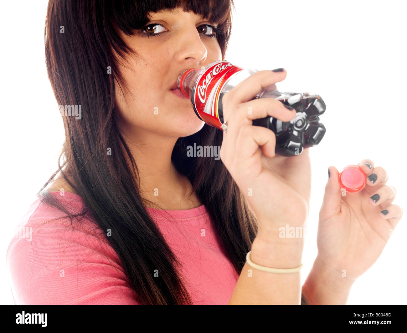 Coca Cola Woman Drinking Bottle High Resolution Stock Photography and ...