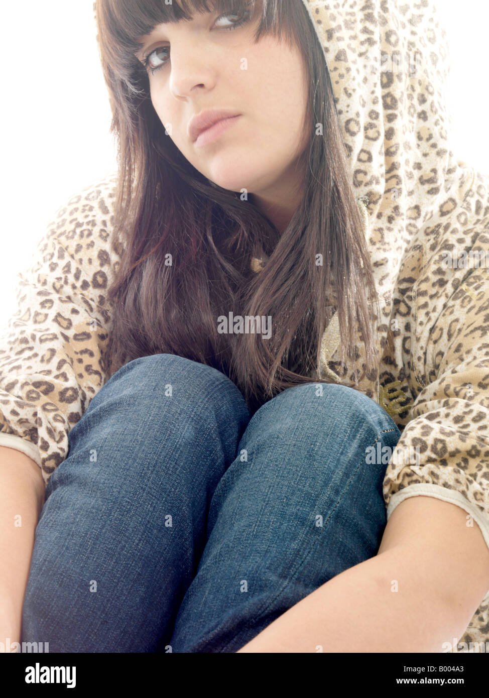 Young Depressed Teenage Girl Or Woman With Negative Thoughts Sitting ...