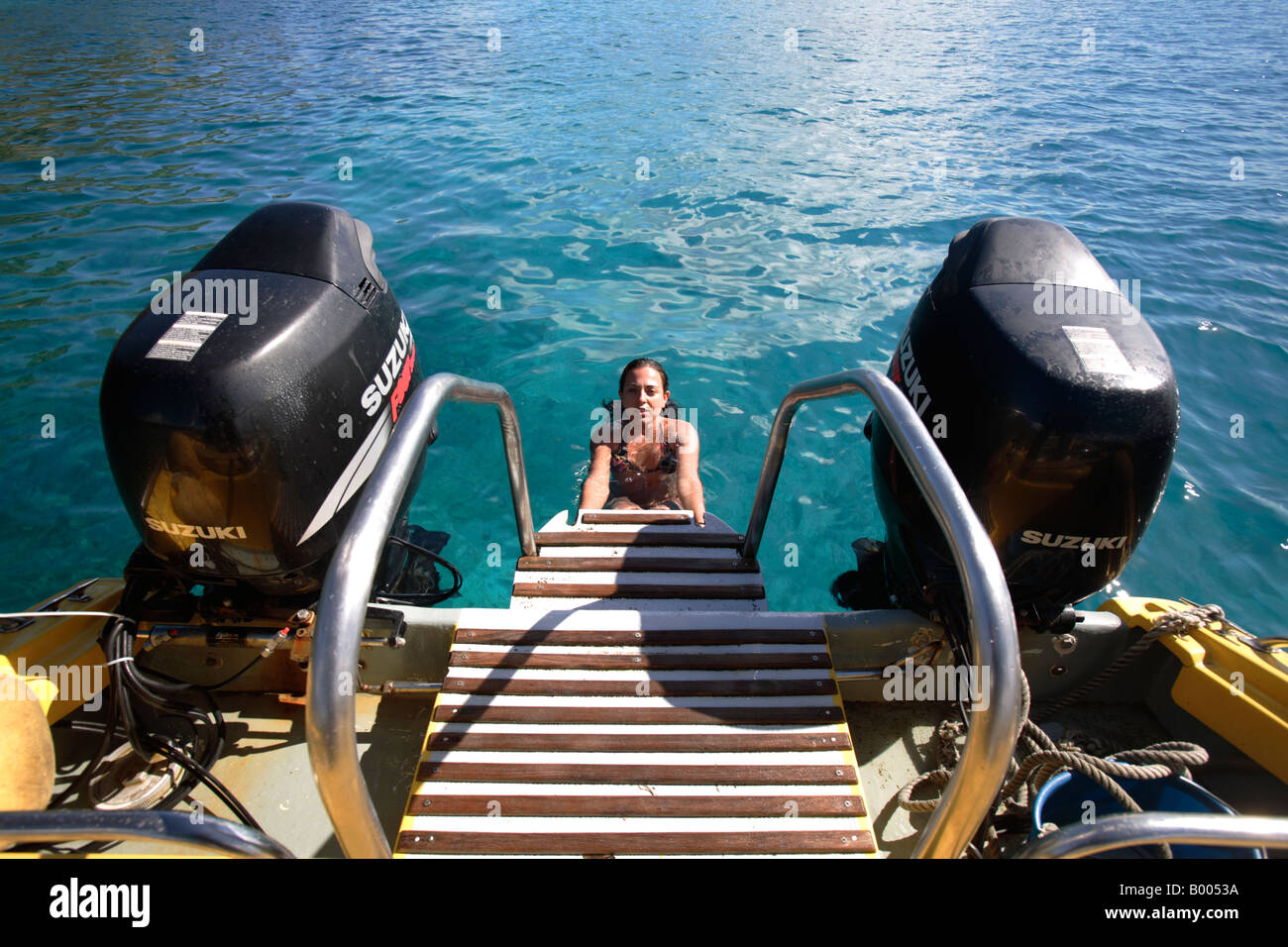 Woman boarding water craft hi-res stock photography and images - Alamy