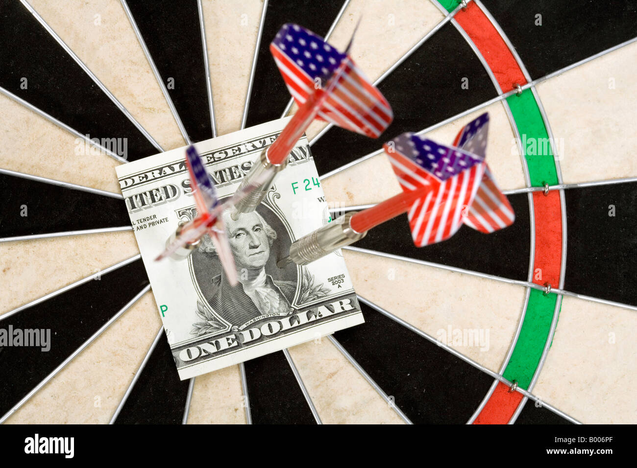 Dart arrows with USA national emblem sticking in the target of a ...
