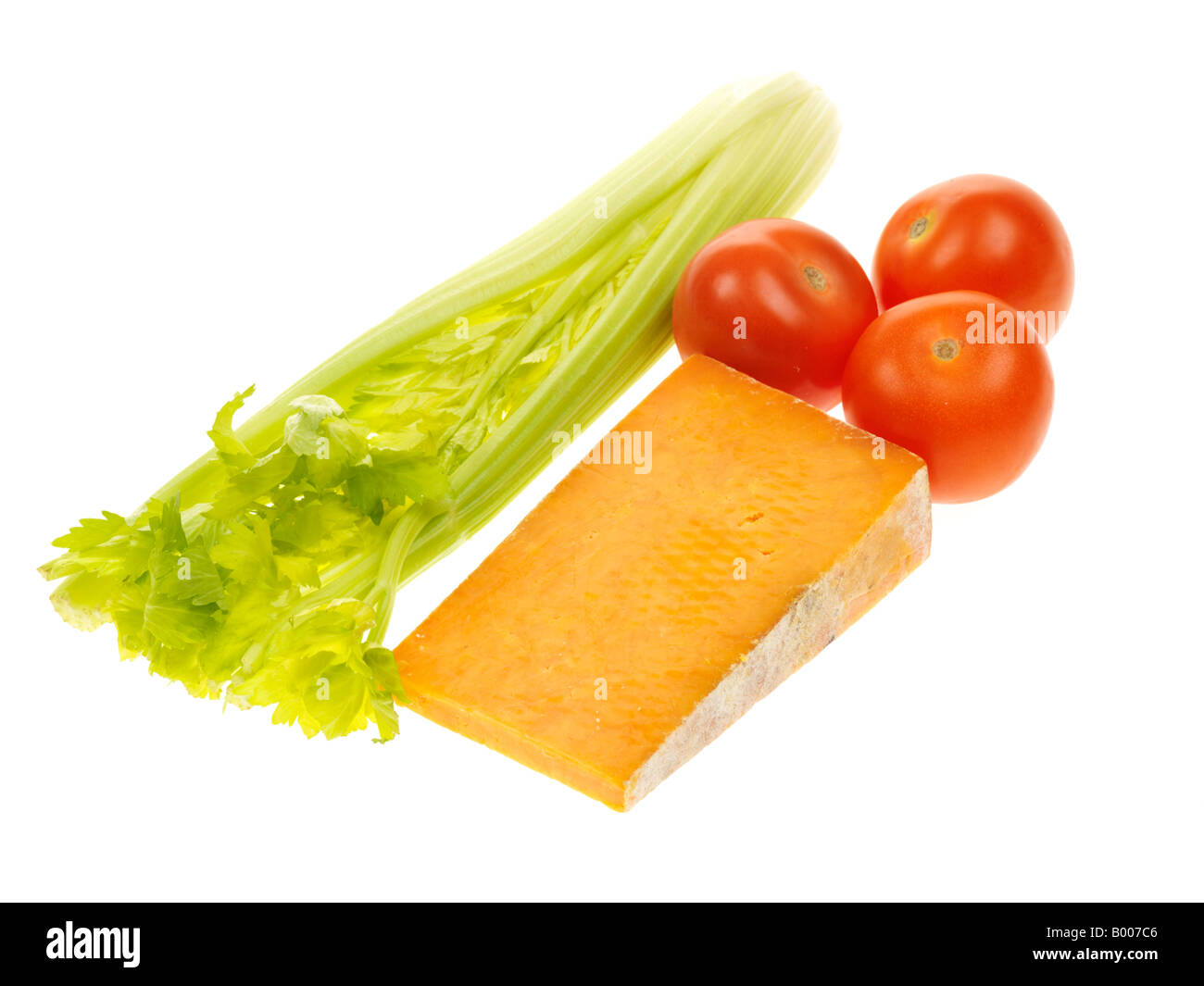 Fresh Block Or Wedge Of Cheese With Healthy Tomatoes And Celery ...