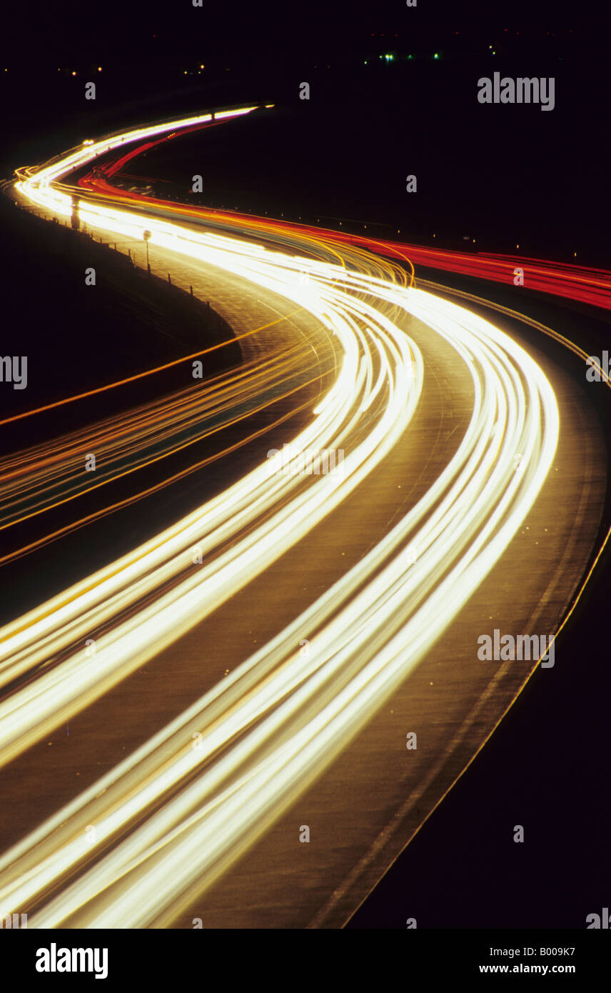 light trails on motorway at night Stock Photo - Alamy