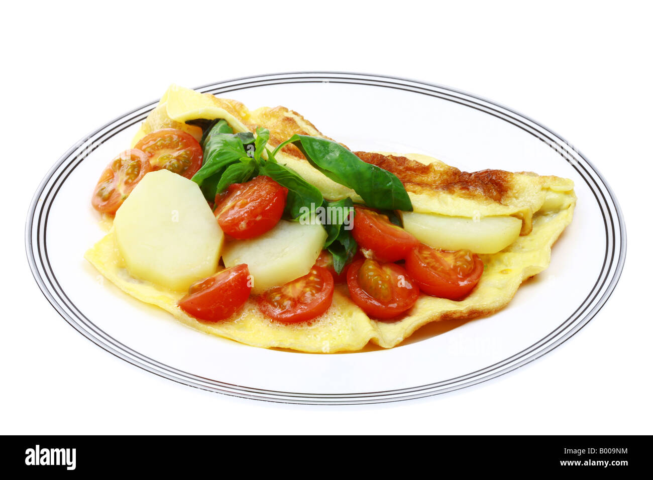 Tomato and Basil Omelette Stock Photo - Alamy