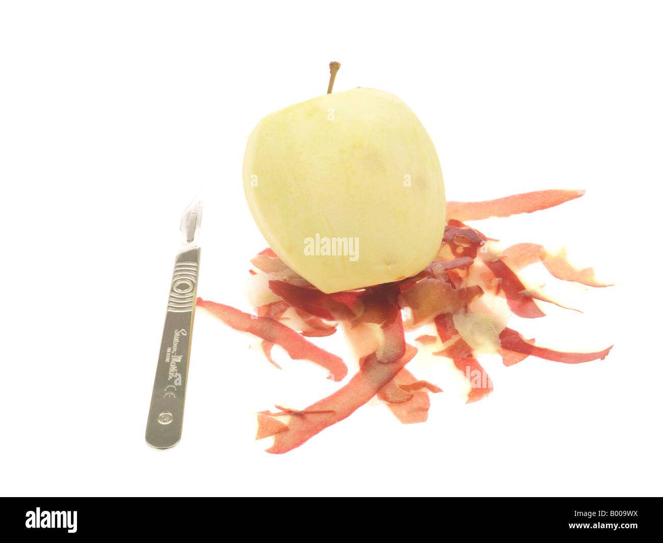 Peeled Apple With Scalpel Stock Photo - Alamy