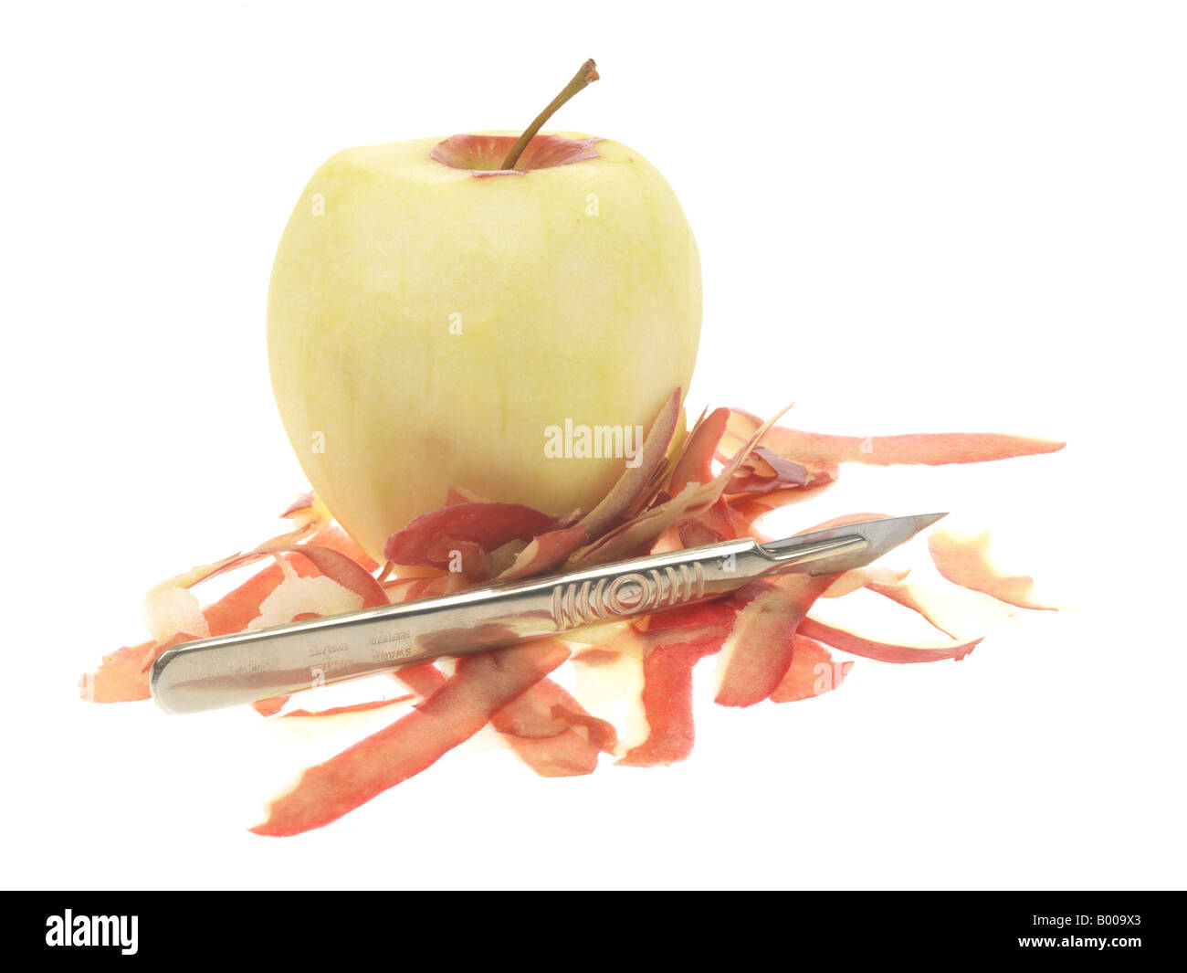 Peeled Apple With Scalpel Stock Photo - Alamy