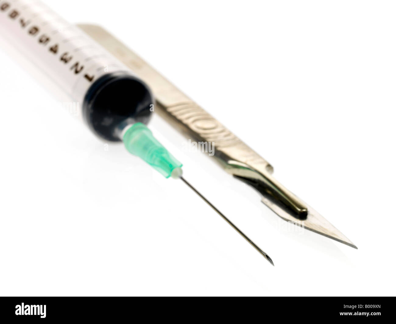 Scalpel and Needle Stock Photo - Alamy