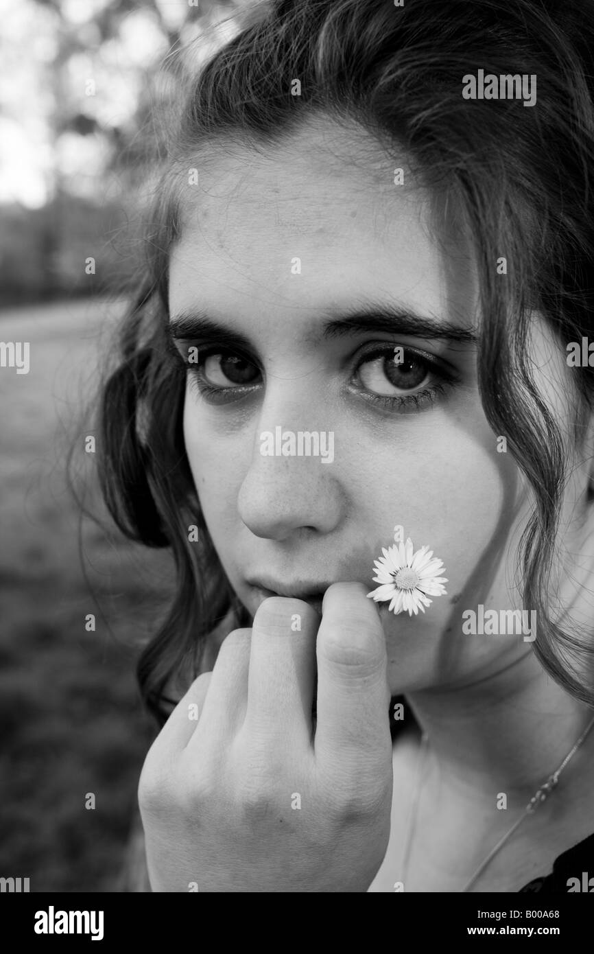 Girl with daisy Stock Photo - Alamy