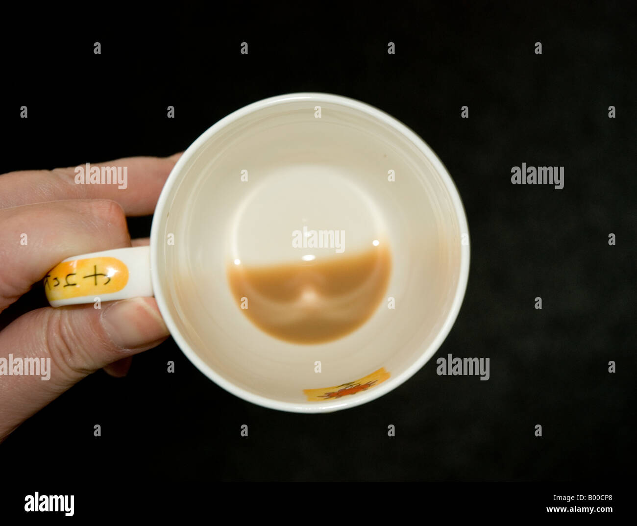 Cup almost empty Stock Photo - Alamy