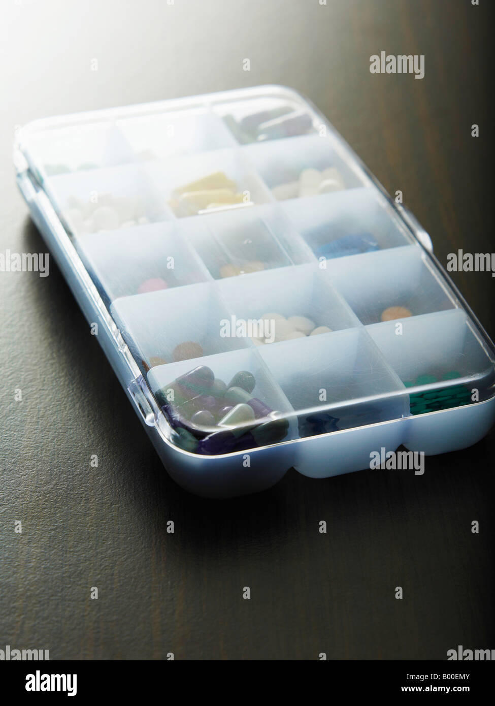 Full view of pill box with pills inside Stock Photo - Alamy