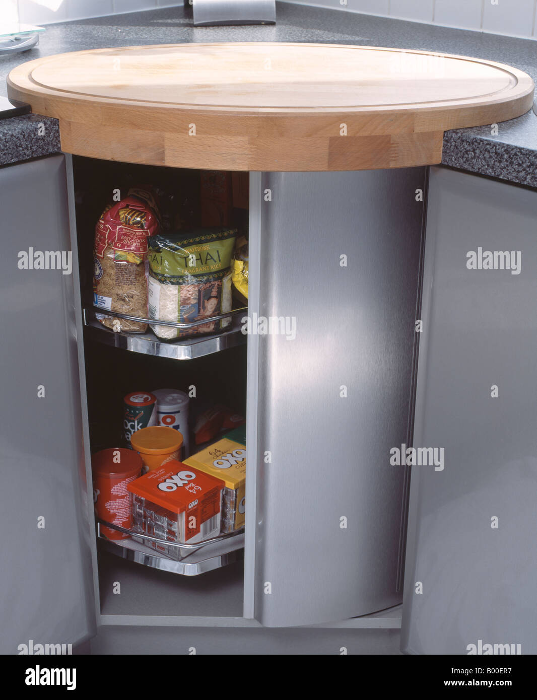 Close up of pulses and stock cubes on shelves in modern carousel ...