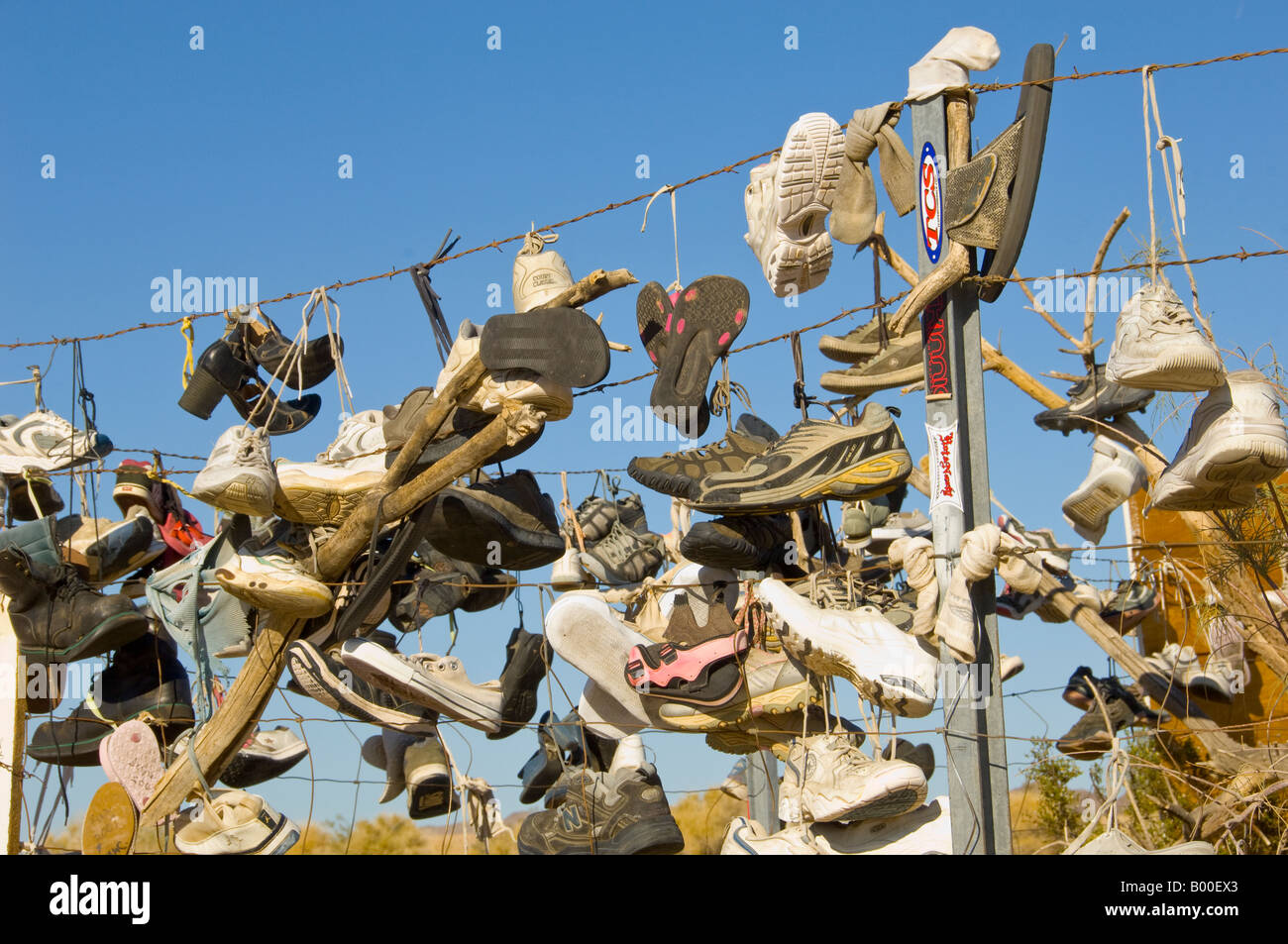 Shoes on a fence hi-res stock photography and images - Alamy