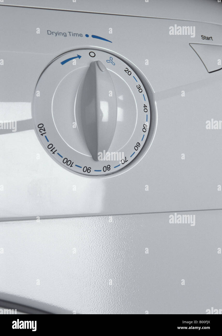 Tumble dryer controls Stock Photo - Alamy