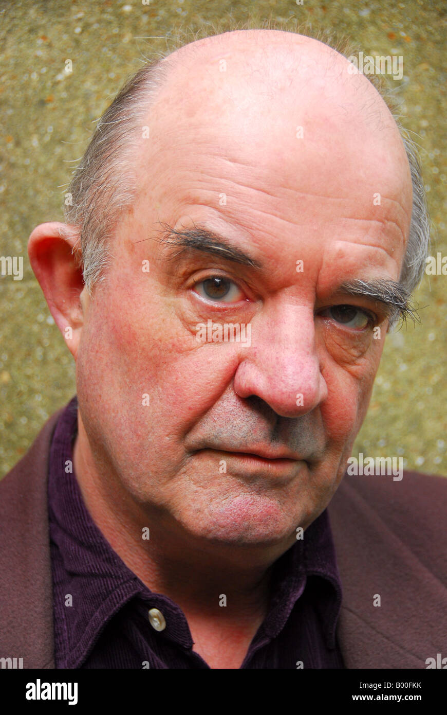 MAN IN HIS LATE 60`s LOOKING SERIOUS Stock Photo - Alamy