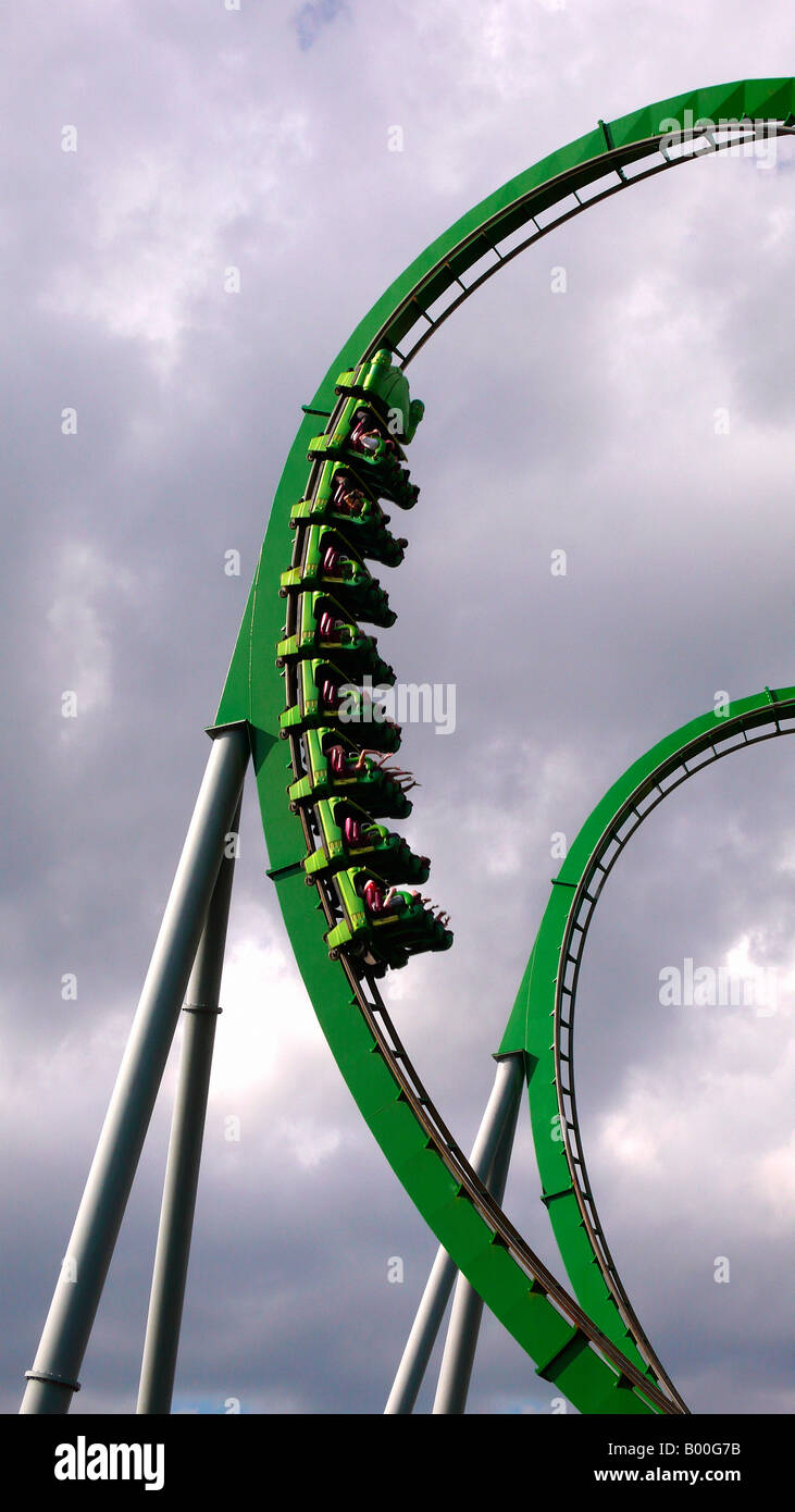 Green roller coaster loop Stock Photo - Alamy