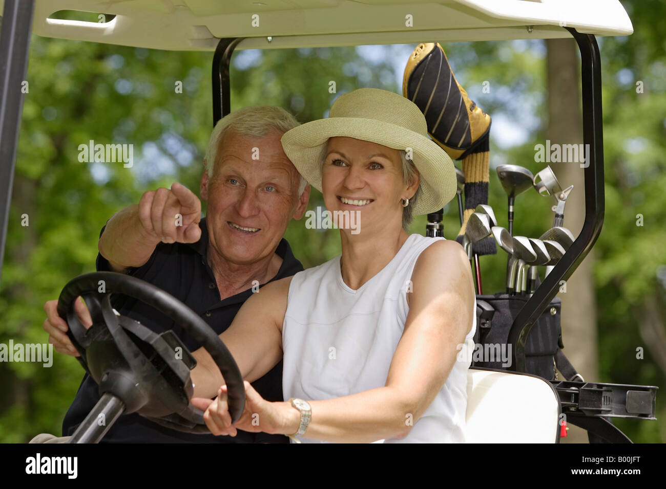Caddy with caddie cart hi-res stock photography and images - Alamy