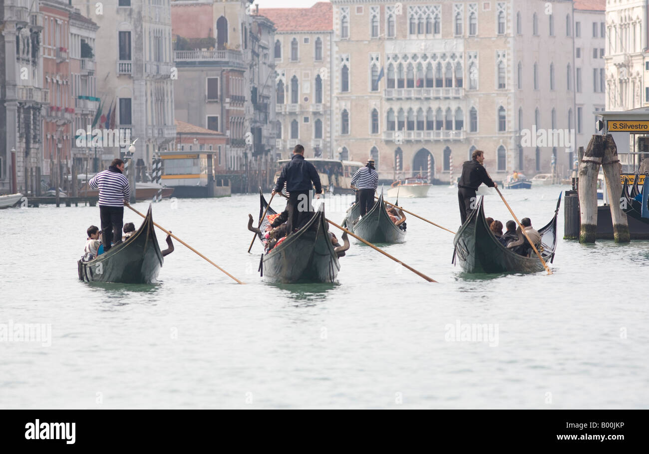 gondoliers and gondolas on the Grand Canal, Venice Stock Photo - Alamy
