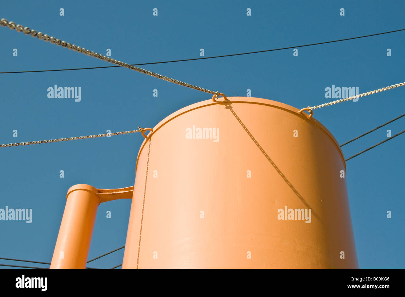 Yellow funnel of a steam ship against the blue sky Stock Photo - Alamy