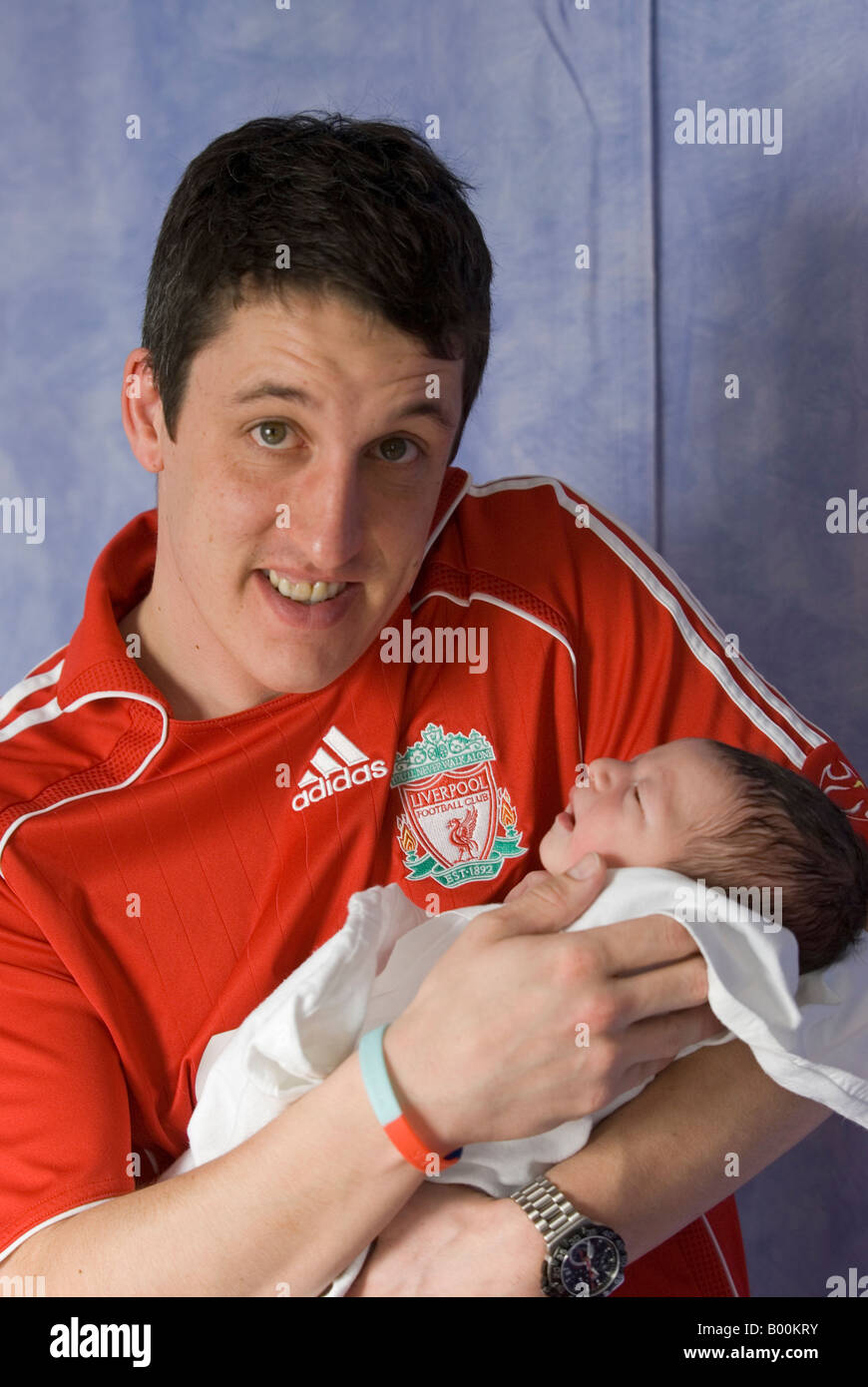 Young dad with his new born baby Stock Photo - Alamy
