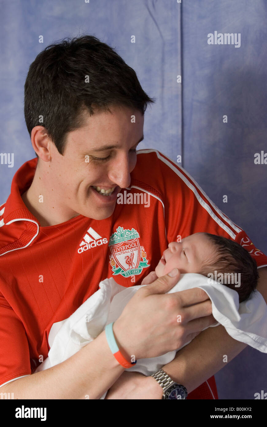 Young dad with his new born baby Stock Photo - Alamy