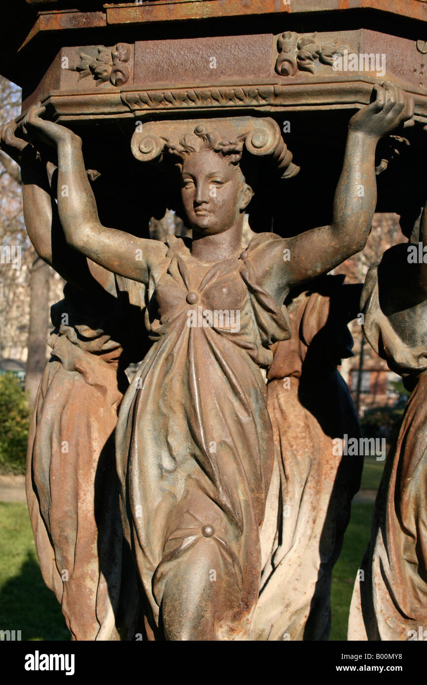 statue greek water drinking fountain park Stock Photo - Alamy