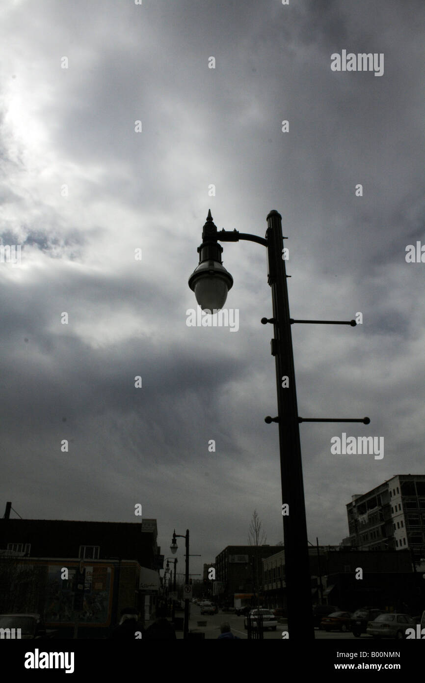 Lamp post and ominous rain clouds with hanging virga--downtown ...