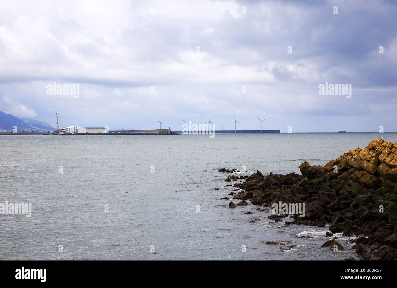 A harbour with wind turbines view Stock Photo - Alamy