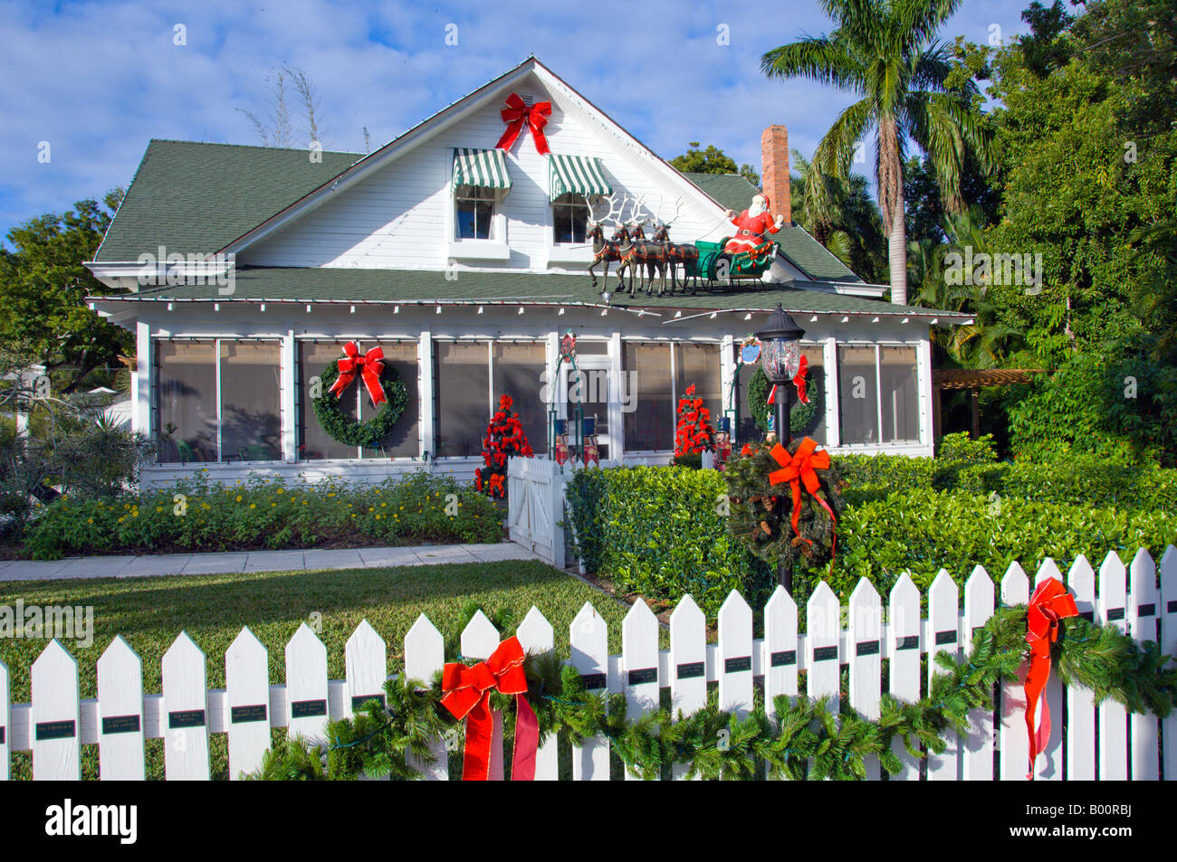 The historic Palm Cottage decorated for Christmas in Naples Florida USA ...