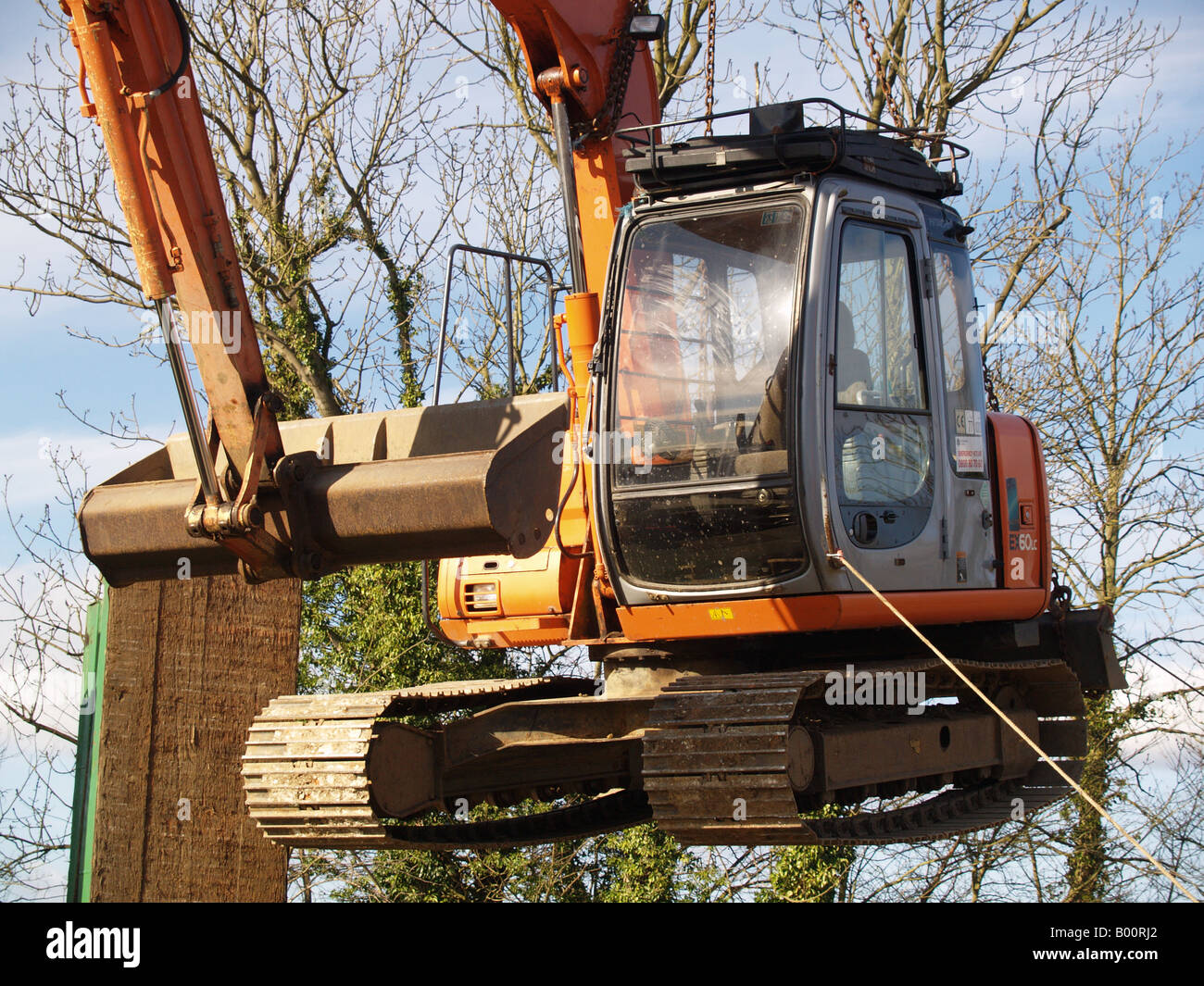 dredger crane scoop raised lifted midair hoisted Stock Photo - Alamy