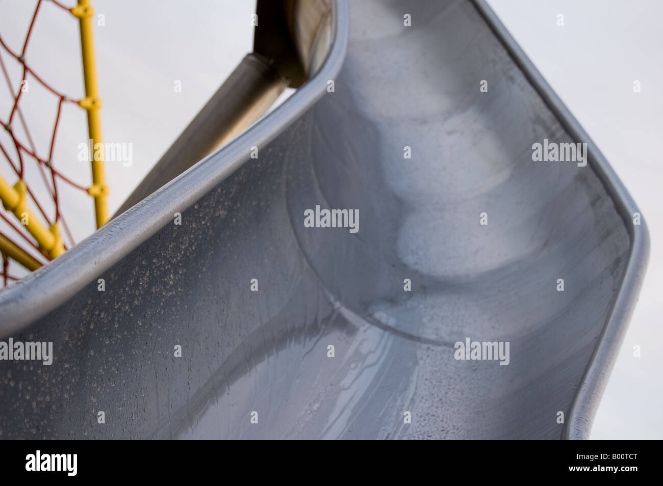 Slide playground rain hi-res stock photography and images - Alamy