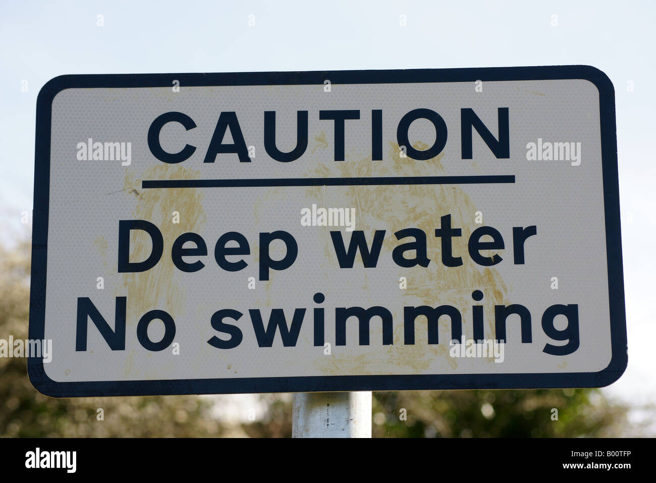 Caution Deep water sign Stock Photo - Alamy