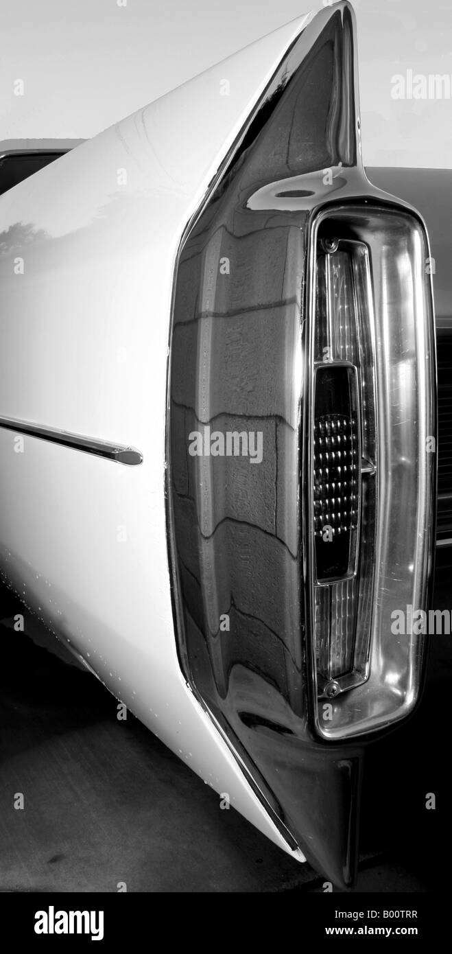 Black & white photo of a tail light of a 1965 cadillac coupe de ville ...