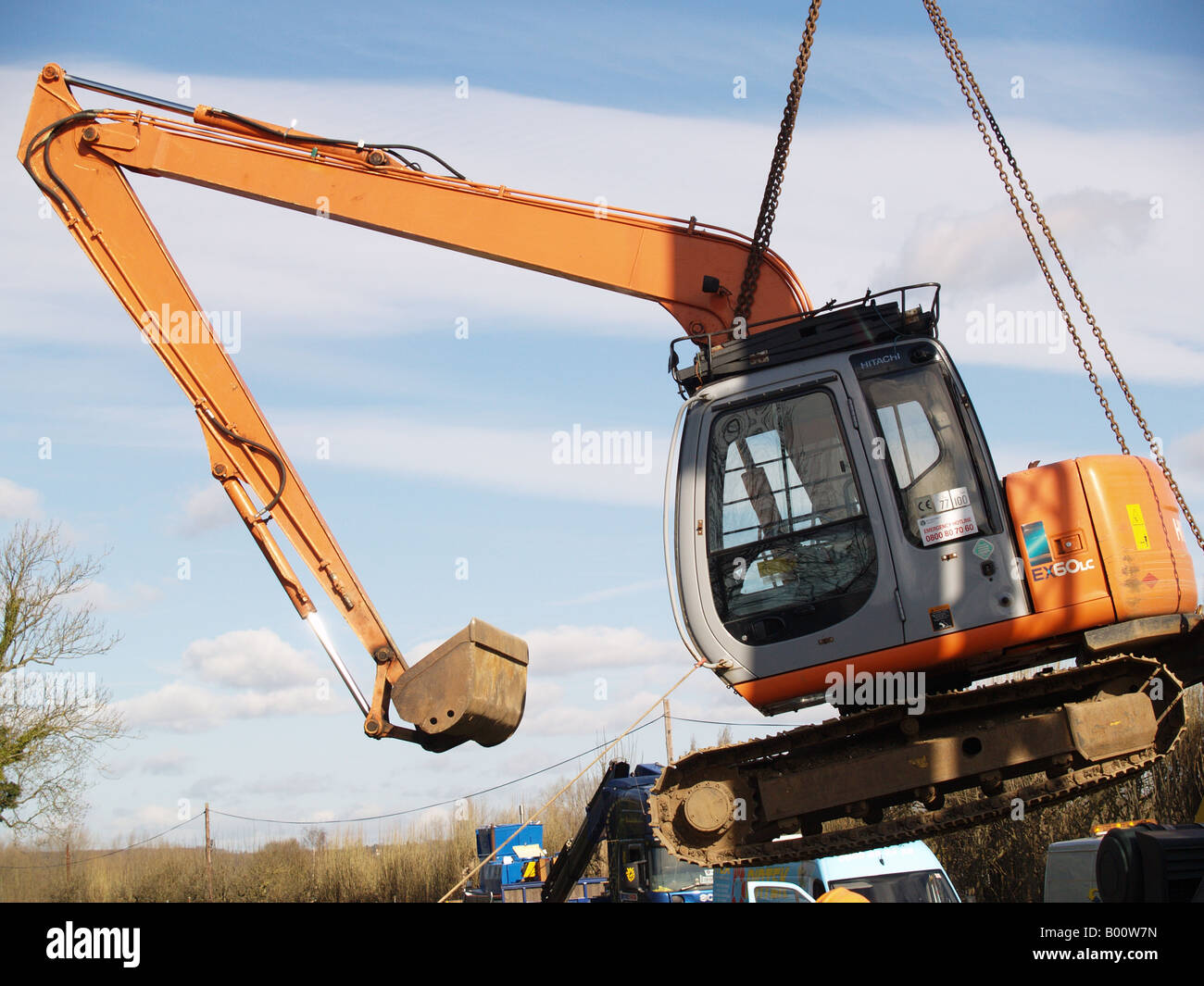 dredger crane scoop raised lifted midair hoisted Stock Photo - Alamy