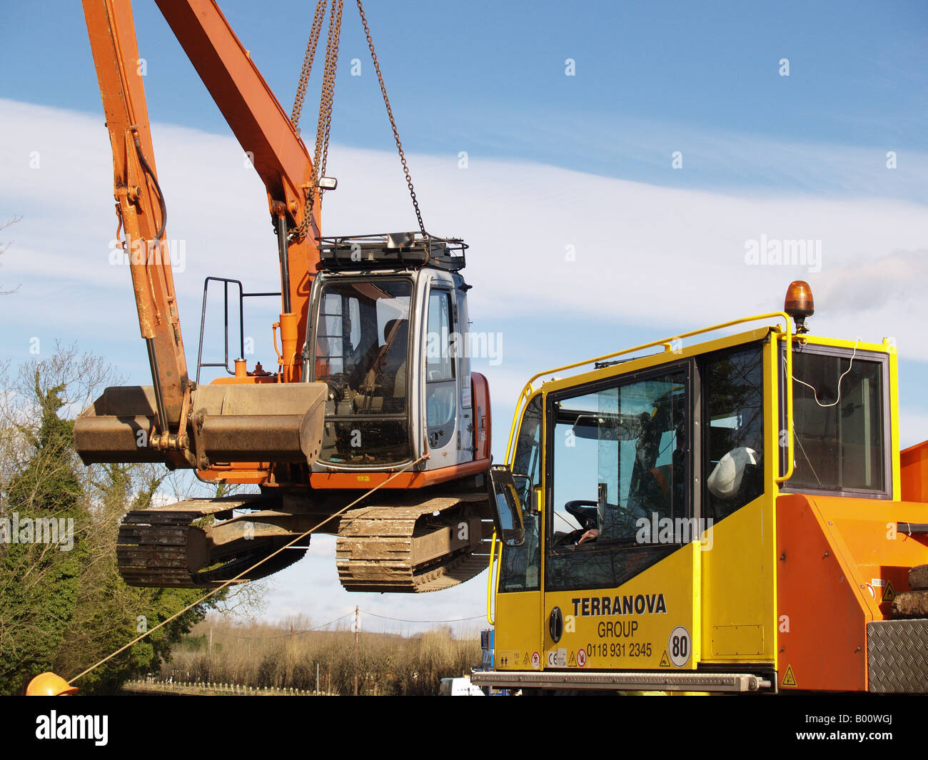 dredger crane scoop raised lifted midair hoisted Stock Photo - Alamy