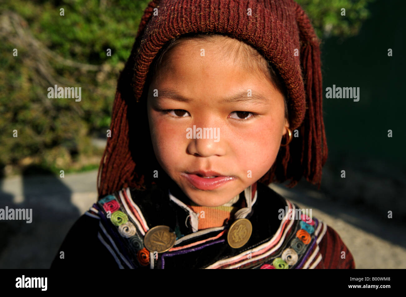 Portrait of a young Hani Akha girl taken in Yunnan China Stock Photo ...