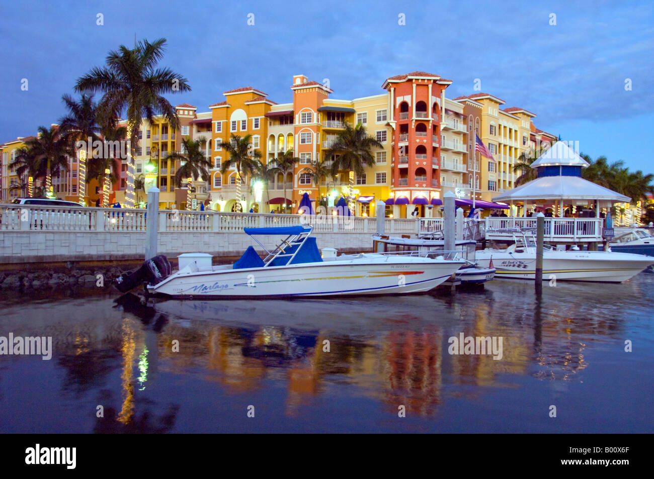 The marina and the Bayfront shopping and dining complex at dusk in ...