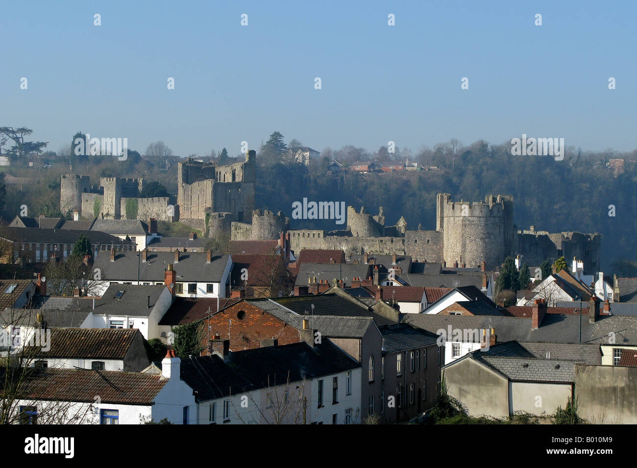 Chepstow Castle above the rooftops of the town Stock Photo - Alamy