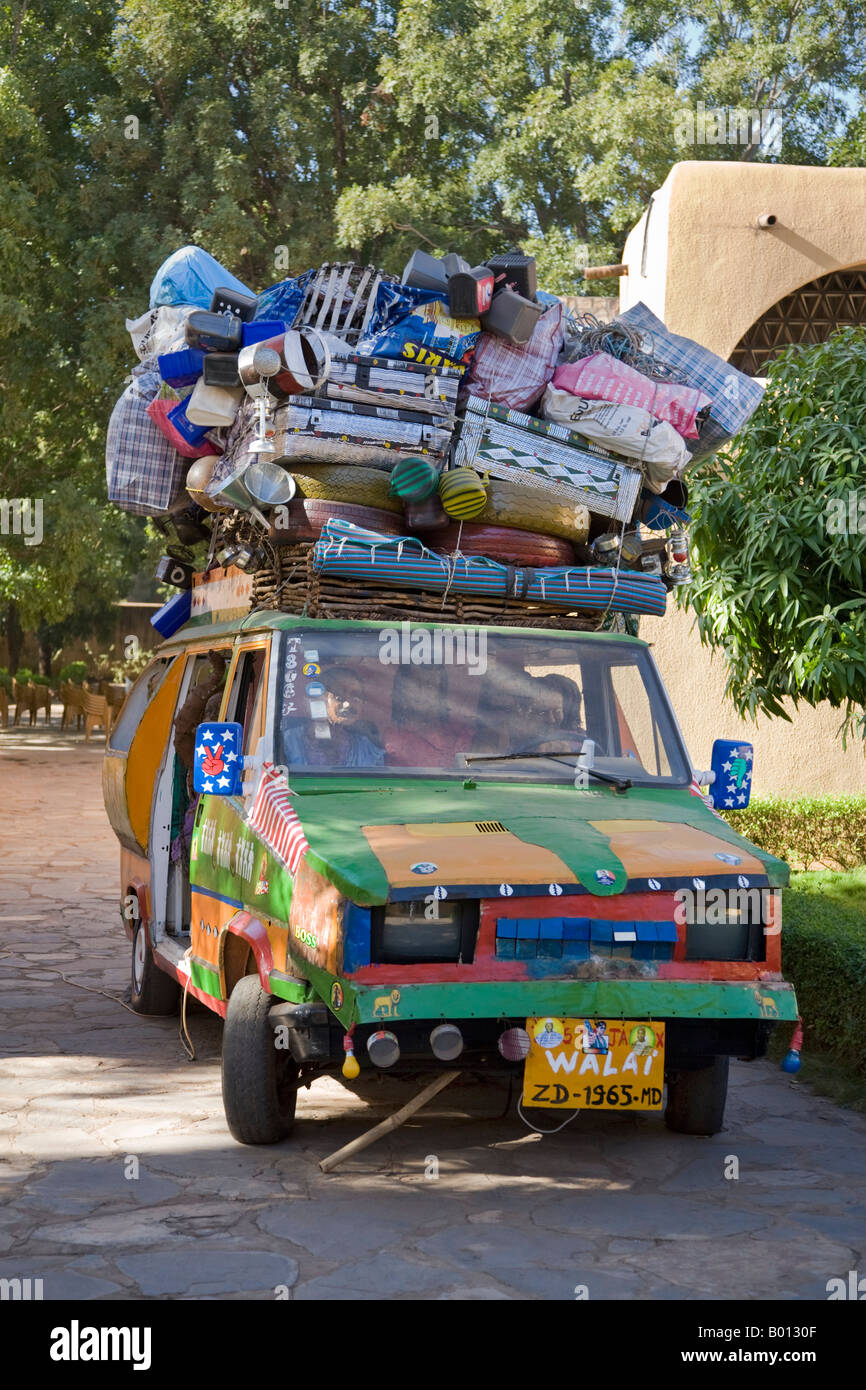 Mali, Bamako. An over-loaded small country bus on display at Musee ...