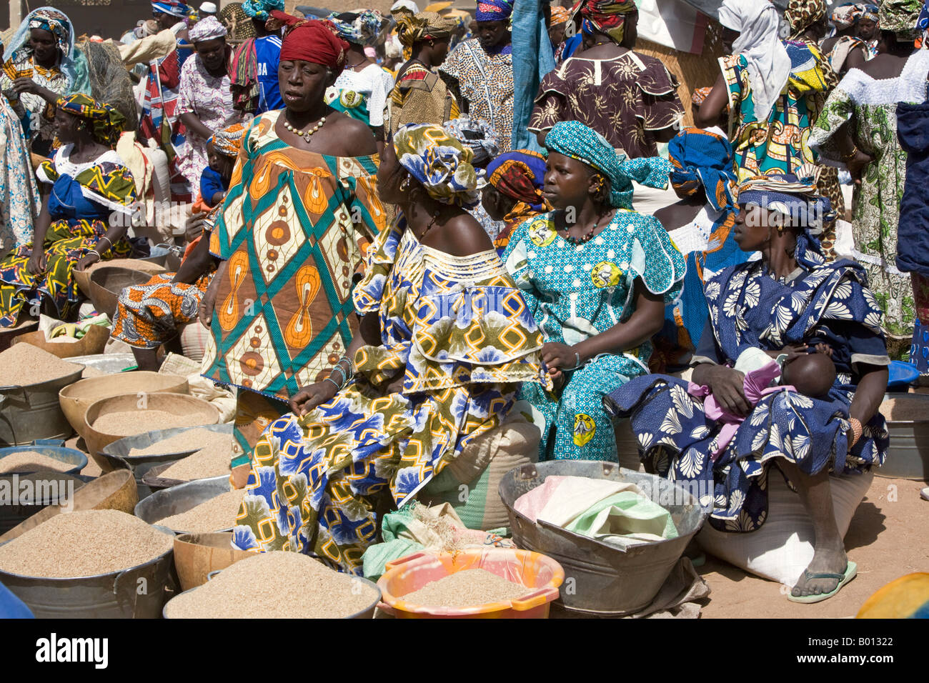 Mali, Djenne. Women selling millet - an important food staple - at ...